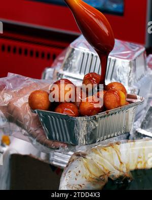 arabic street food Logma or Legaimat (Lugaimat) preparation, is one of ...