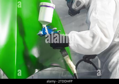 The procedure of painting a car in the service center Stock Photo - Alamy