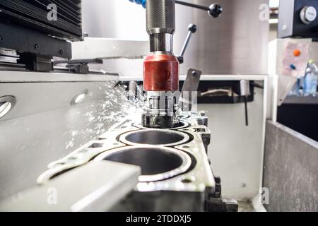 CNC Automatic Cylinder Honing Machine of engine. Car workshop, machine ...