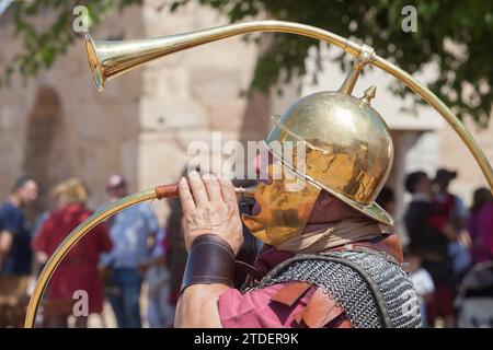 Merida, Spain - June 4th, 2023: Roman war-trumpeter performing. Emerita ...