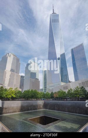 The reflecting pools in the 9/11 Memorial Park at Ground Zero as seen ...