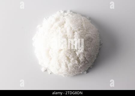 Finely ground Sea Salt piled in circle shape isolated on white ...