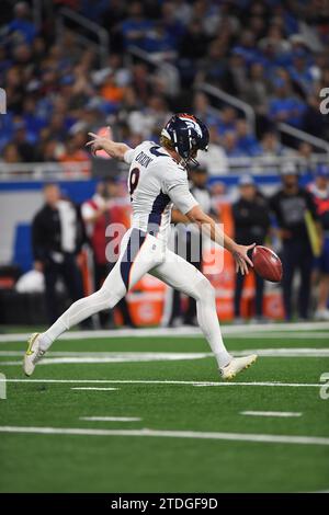Denver Broncos punter Riley Dixon punts during the second half of an ...