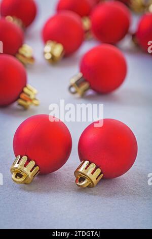 composition of small red christmas baubles on gray background Stock ...