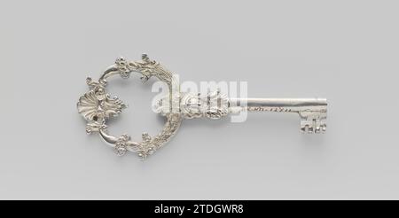 Key of a tabernacle door. Cast silver and scilated. The ring is formed ...