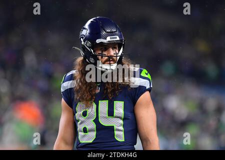 Seattle Seahawks tight end Colby Parkinson, right, catches a pass for a ...