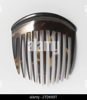 Hair comb of imitation turtle with an unadorned round back that stands ...