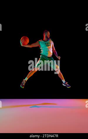 Professional basketball player honing skills with precision dribbling ...