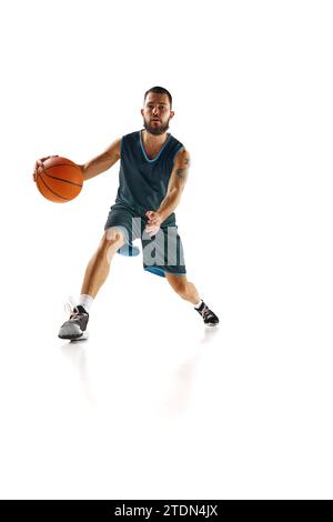 Dynamic shot capturing skilled basketball player in action, focused and ...