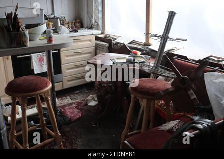 A residential apartment building is seen damaged after a Russian strike ...