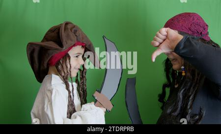 Pirates getting angry and fighting with cutlasses. Isolated on green ...