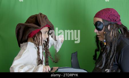 Pirates getting angry and fighting with cutlasses. Isolated on green ...