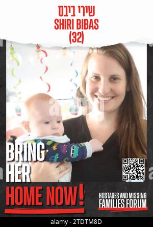 A poster shows Shiri Bibas, who was kidnapped to Gaza with her husband ...