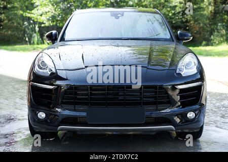 Clean auto after washing at outdoor car wash Stock Photo - Alamy
