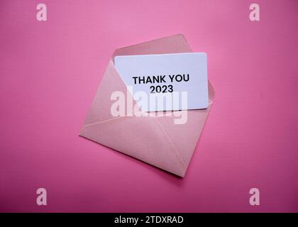 Thank you 2023 card in a white envelope with color background. bye-bye ...