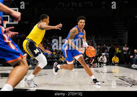 Florida guard Will Richard (5) drives during the second half of an NCAA ...