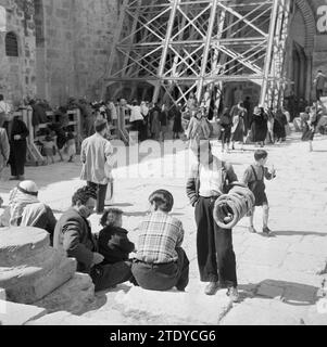 Easter celebration. Believers at the entrance to the Church of the Holy ...