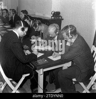 Men training on telegraph keys for World War II telegraph operator work ...