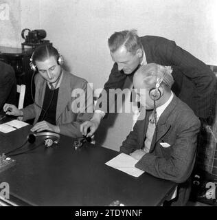 Men training on telegraph keys for World War II telegraph operator work ...