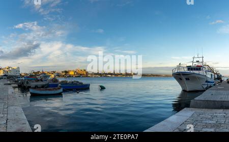 Taranto, Italy - 30 November, 2023: fishing boats and docks in the ...