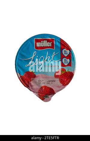 pot of Muller light strawberry fat free yogurt opened with lid peeled ...