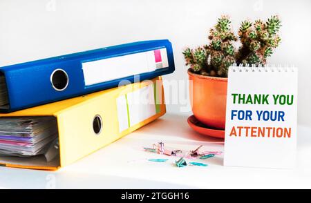 Creative concept Thank you for your attention text on notepad on white ...