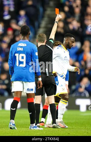 St Johnstone's Diallang Jaiyesimi is shown a red card and is sent off ...