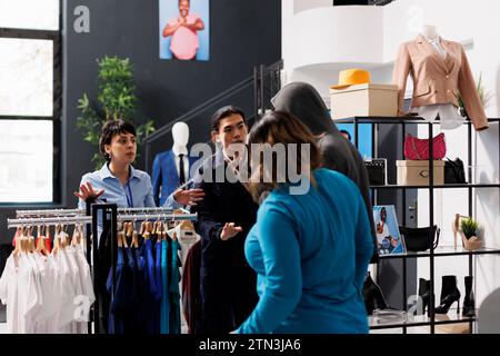 Woman Stealing Clothes From Store Stock Photo - Alamy