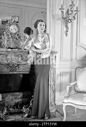 The Countess of Paris poses in a Paris hotel in a Paquin dress ca. 1936 ...