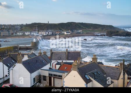 Findochty bay along the coast with a turbulent sea. Findochty ...