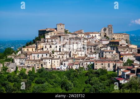 The small hilltop town of Altomonte with the massive walls of the ...