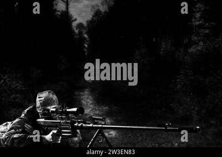 Sniper took the position and waits for the goal. Mixed media Stock ...