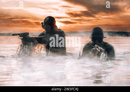 Team of fighters of a special unit move on water to complete the task ...