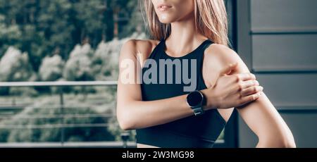 Charming girl posing with a smart watch. No name portrait. The concept ...