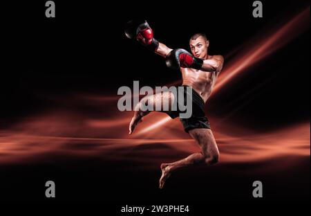 Flying mma fighter. Kickboxing concept. Knee strikes. High quality ...
