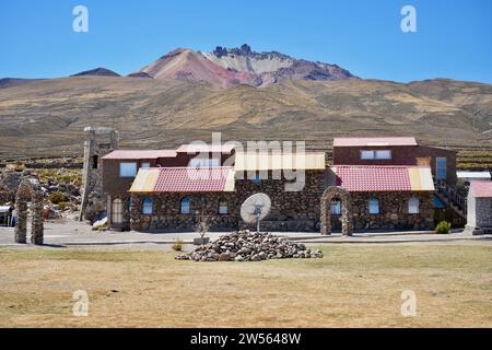 Buildings in the Village with Tunupa Volcano behind. Coqueza Canton ...