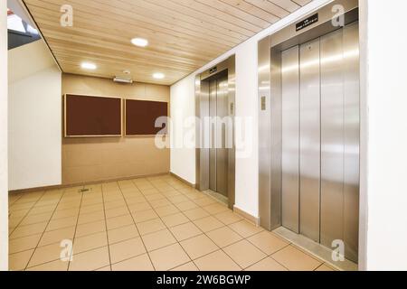 Illuminated Elevators Sign Stock Photo - Alamy
