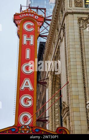 Large orange and yellow Chicago sign with white lettering above a ...
