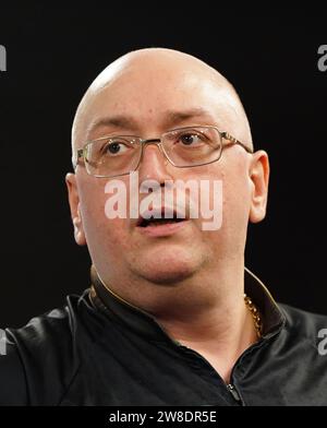 Andrew Gilding in action against Luke Littler (not pictured) on day ...