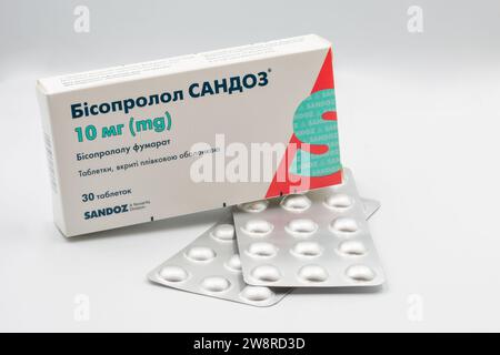 A box and blister pack of generic Bisoprolol Fumarate tablets - white ...