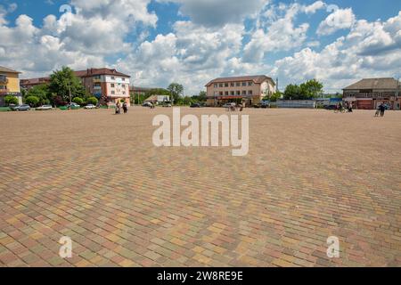 Sarny, Ukraine - June 30, 2023: People walking in the Central Square ...