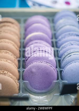 Background of colored sweet macaroons with bokeh Stock Photo - Alamy