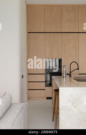 Modern interior of a combined kitchen and living room with colors of ...