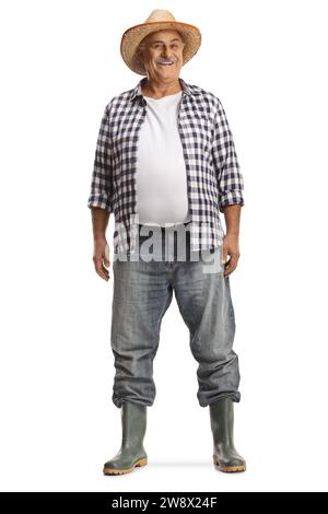 Mature farmer wearing gumboots isolated on white background Stock Photo ...