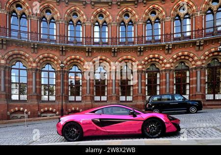 Pink McLaren 570s outside St. Pancras Renaissance Hotel in London Stock ...