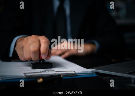 Authorized person rubber stamps contract certificates and office ...
