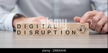 Wooden blocks with symbol of digital disruption concept Stock Photo - Alamy