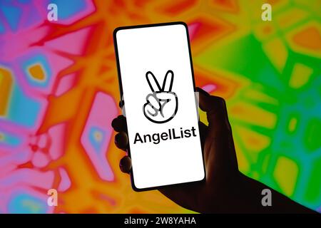 In this photo illustration, the AngelList logo is displayed on a ...