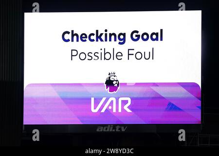 Referee Anthony Taylor reviews the on-field VAR screen before ...