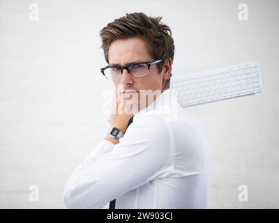 Man, angry and hitting with keyboard, boss and portrait to employee for ...